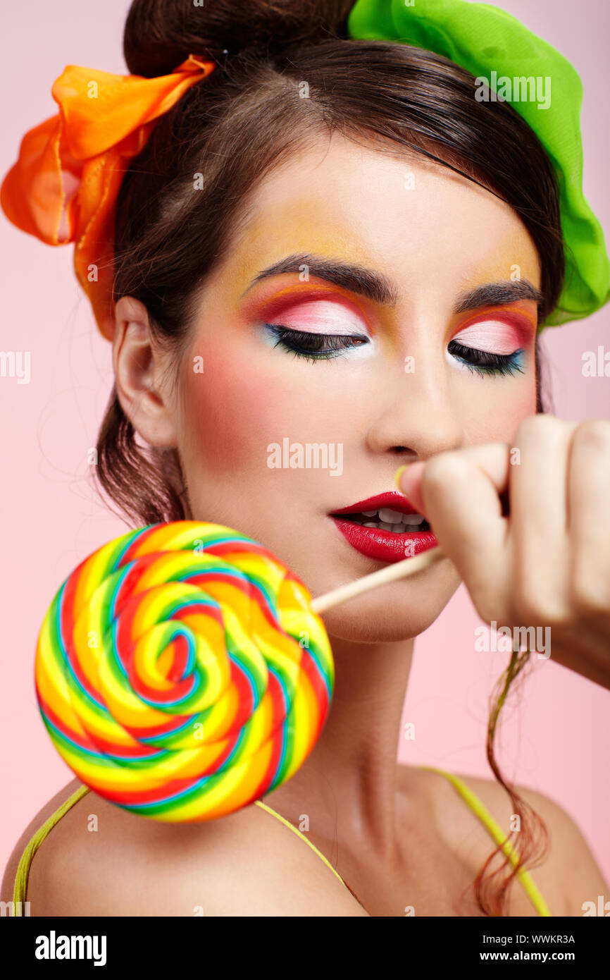 portrait of beautiful girl with big lollipop Stock Photo - Alamy