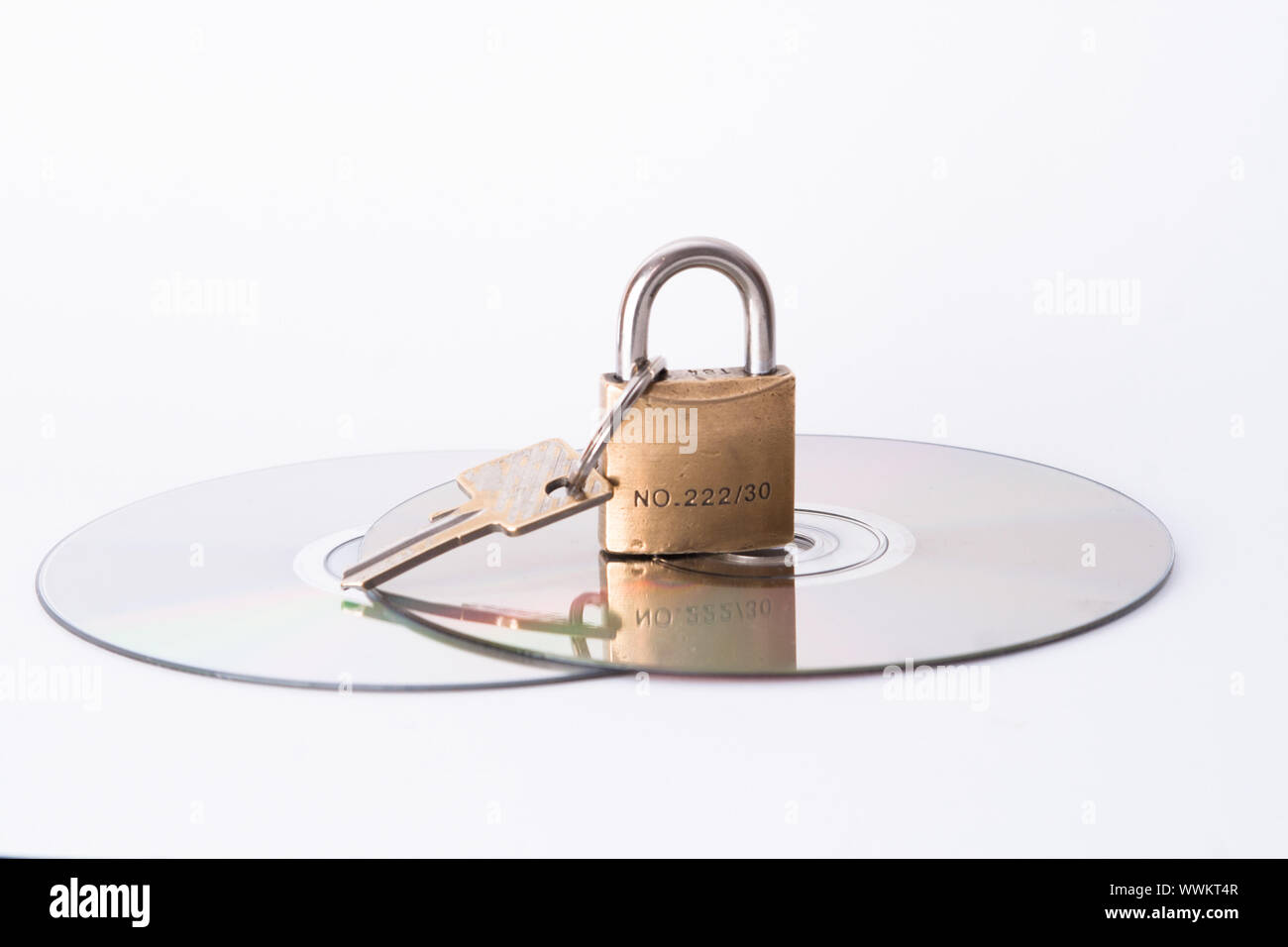 Computer disk and lock isolated on white background Stock Photo - Alamy