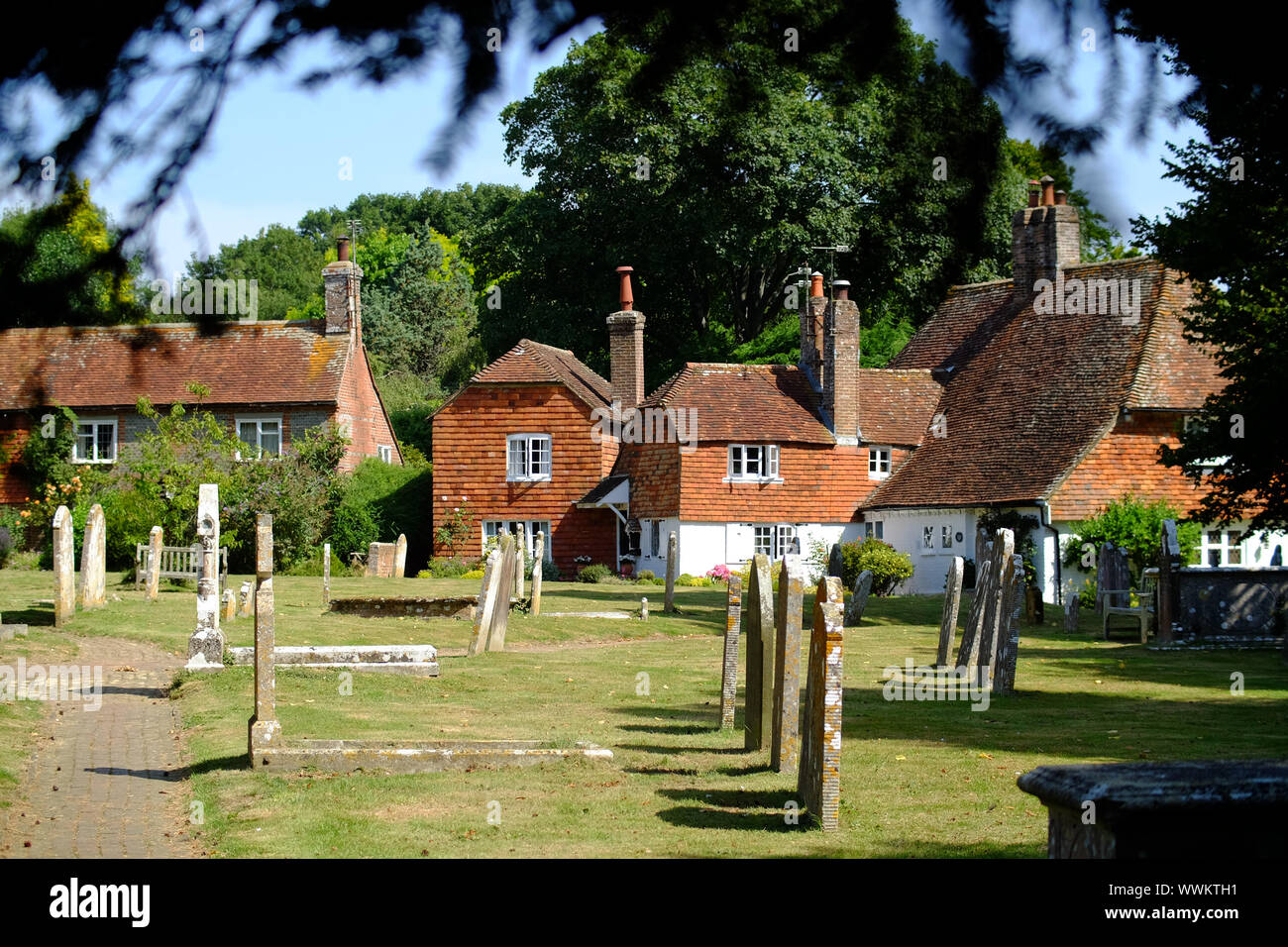Pretty churchyard of Hellingly village church, East Sussex, UK Stock ...