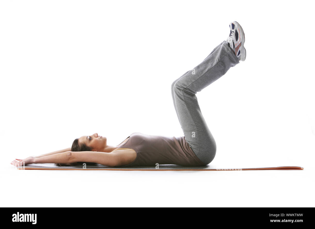 Fitness woman doing fitness exercise on mat . White background Stock ...