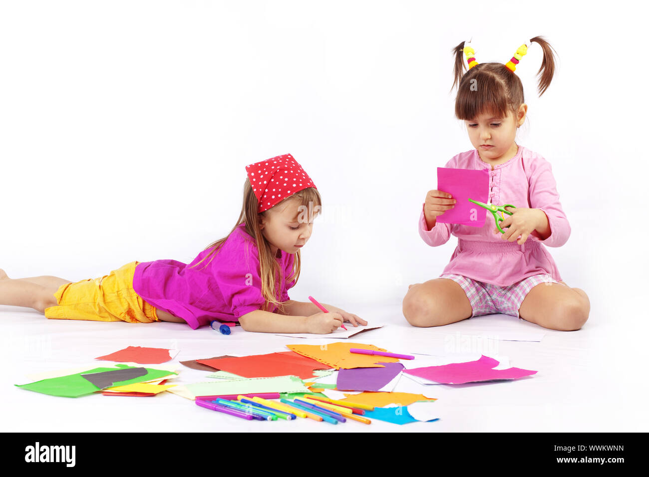 Happy kid playing paper Cut Out Stock Images & Pictures - Alamy