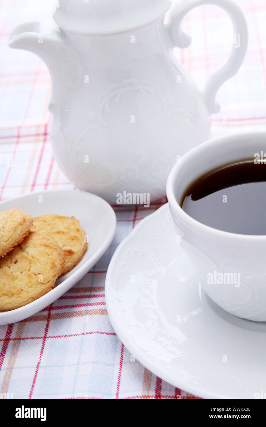 fresh biscuits with a pot of coffee and a cup of tea Stock Photo - Alamy
