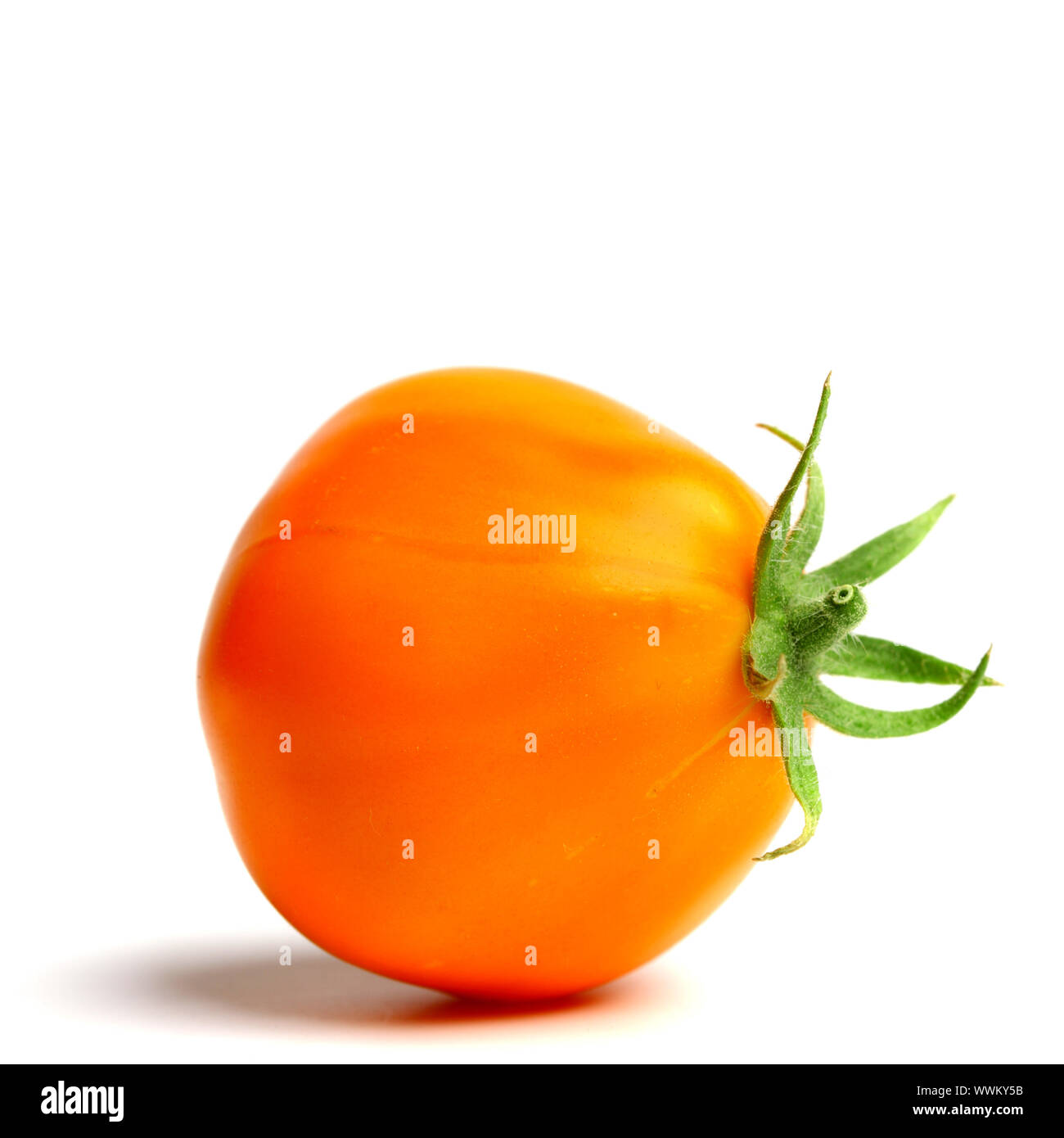 orange tomato isolated on white Stock Photo - Alamy