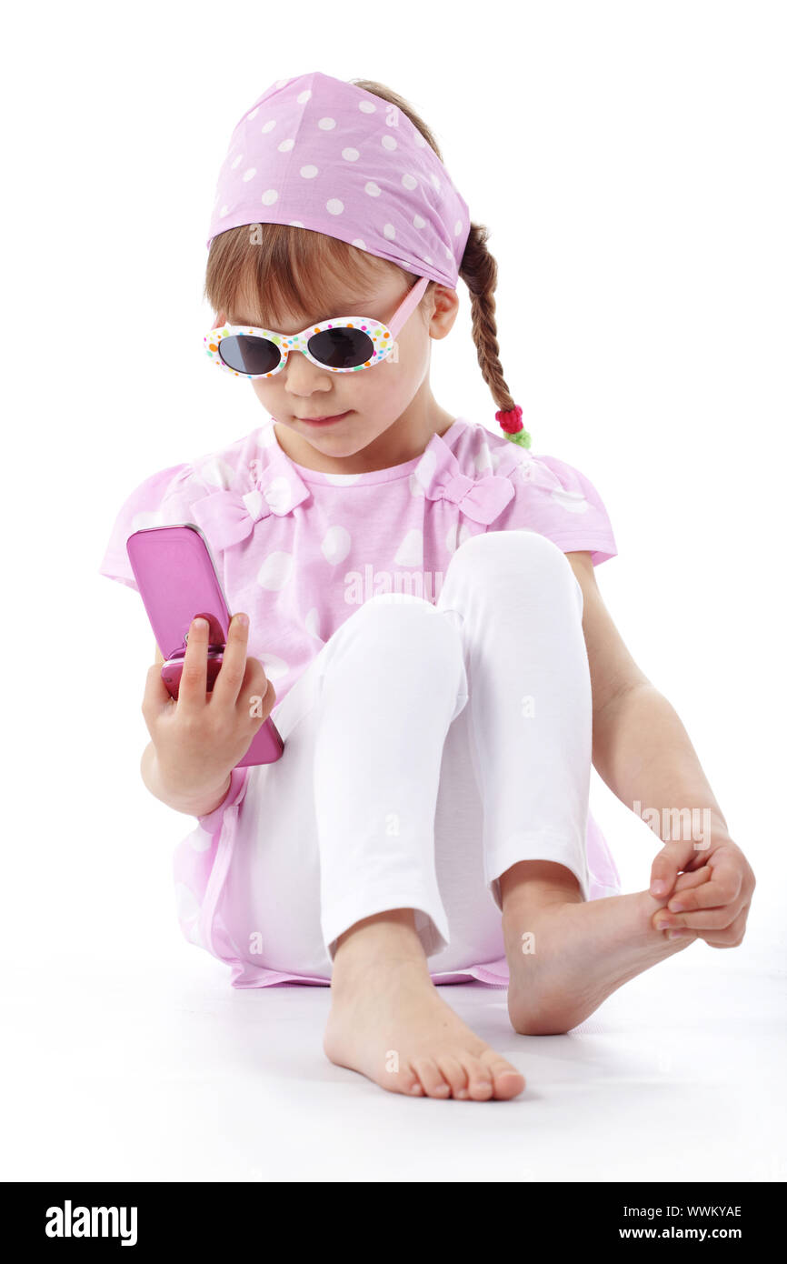 Fashion little girl studio series over white Stock Photo - Alamy