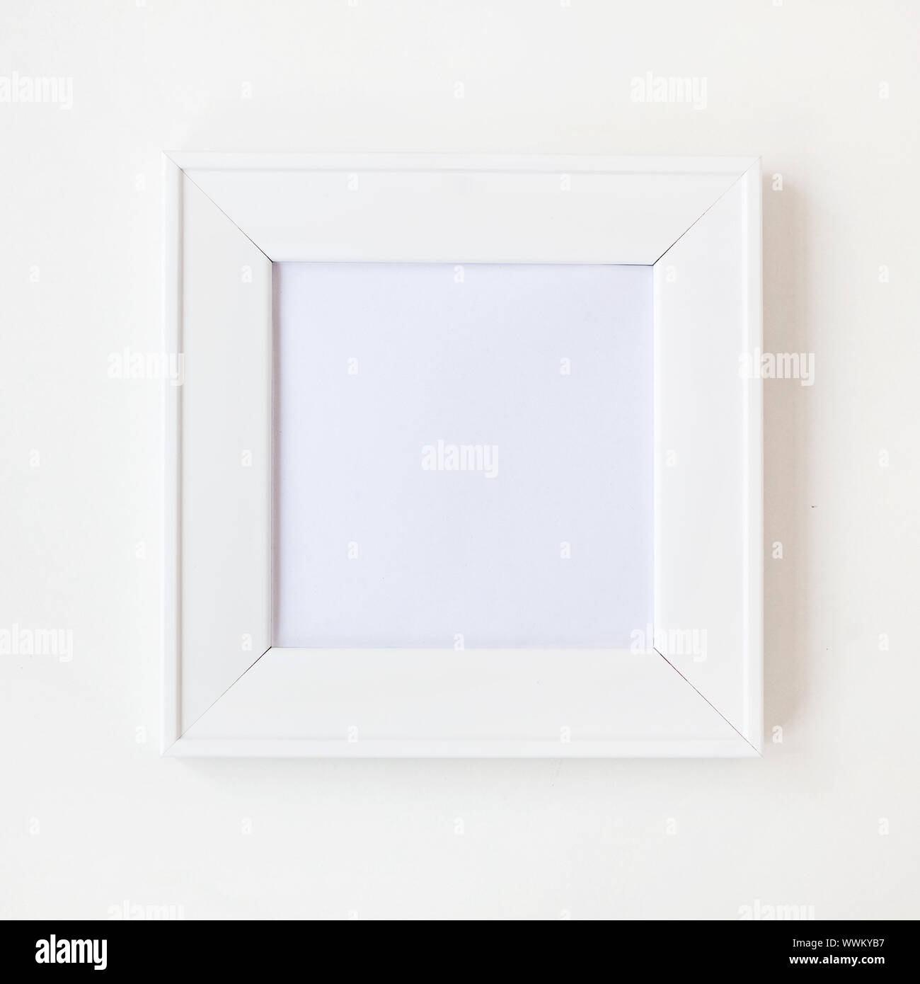 Square simple blank white photo frame on wall Stock Photo - Alamy