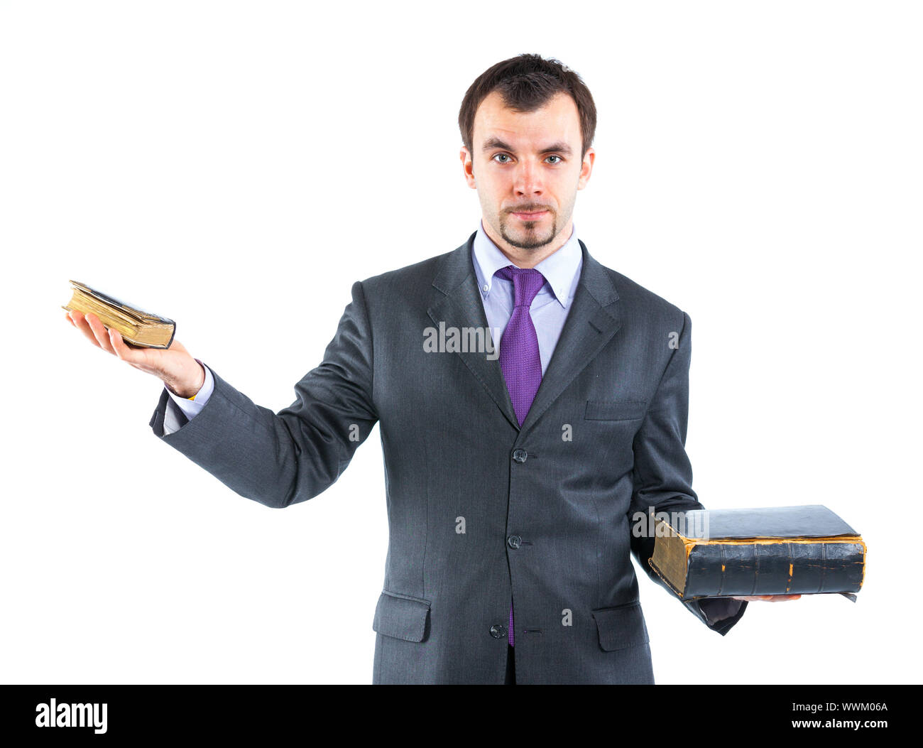 Portrait of a business man with book isolated on white background ...
