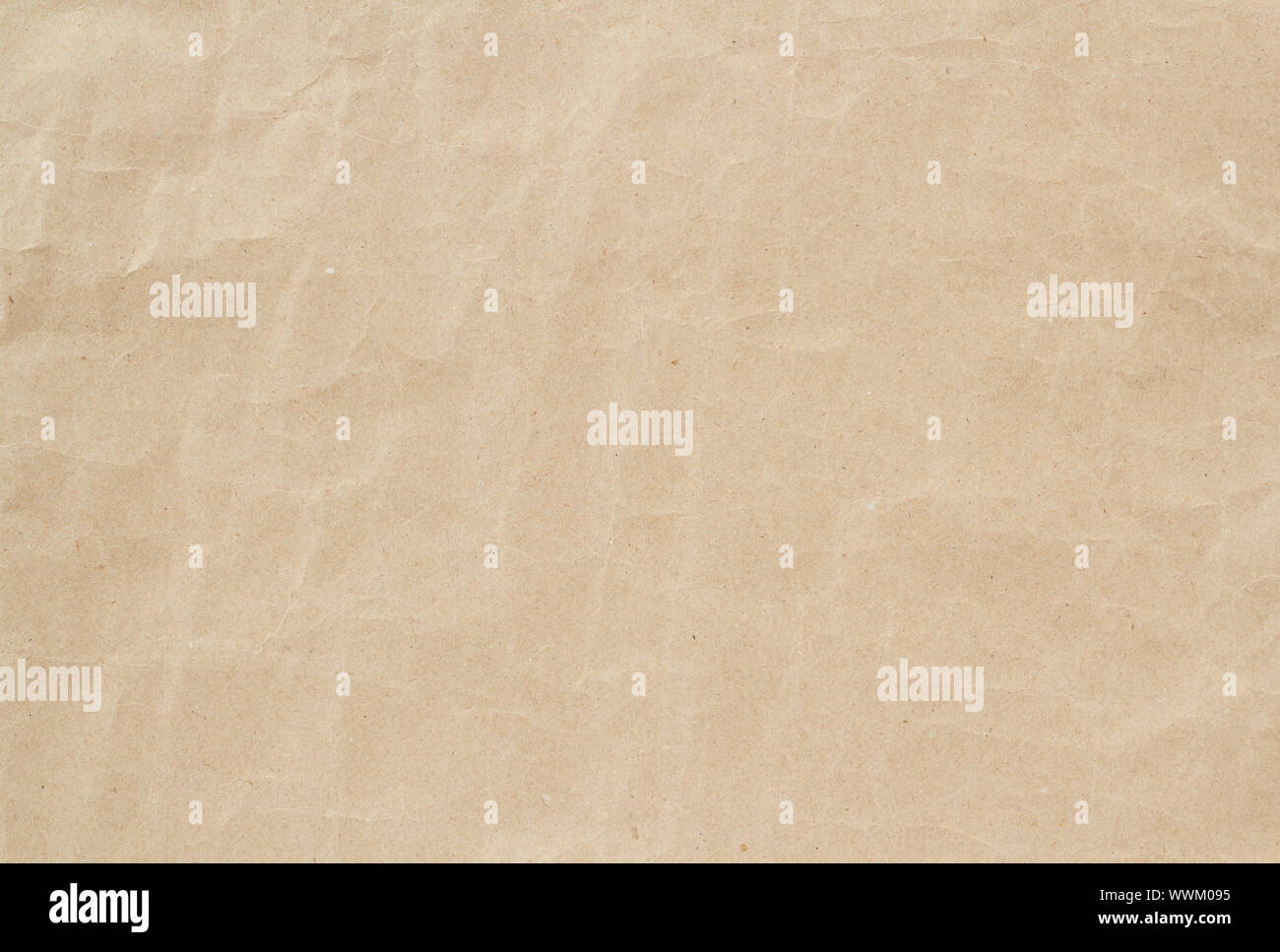 light brown crumpled paper texture or background Stock Photo - Alamy