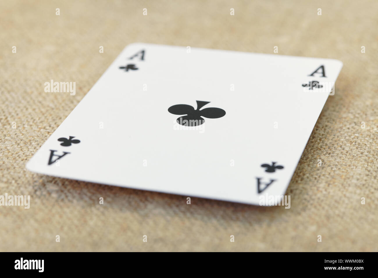 The ace of spades lies on a table covered with a fabric Stock Photo - Alamy