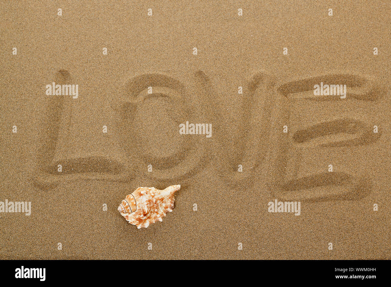 love message written in sand Stock Photo - Alamy