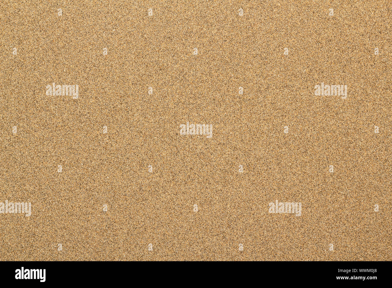 Sandy beach background texture Stock Photo - Alamy