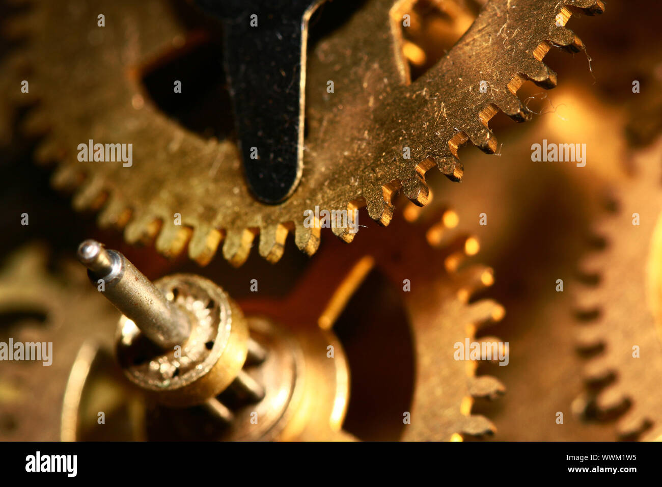 time gear inside my rare clock Stock Photo - Alamy