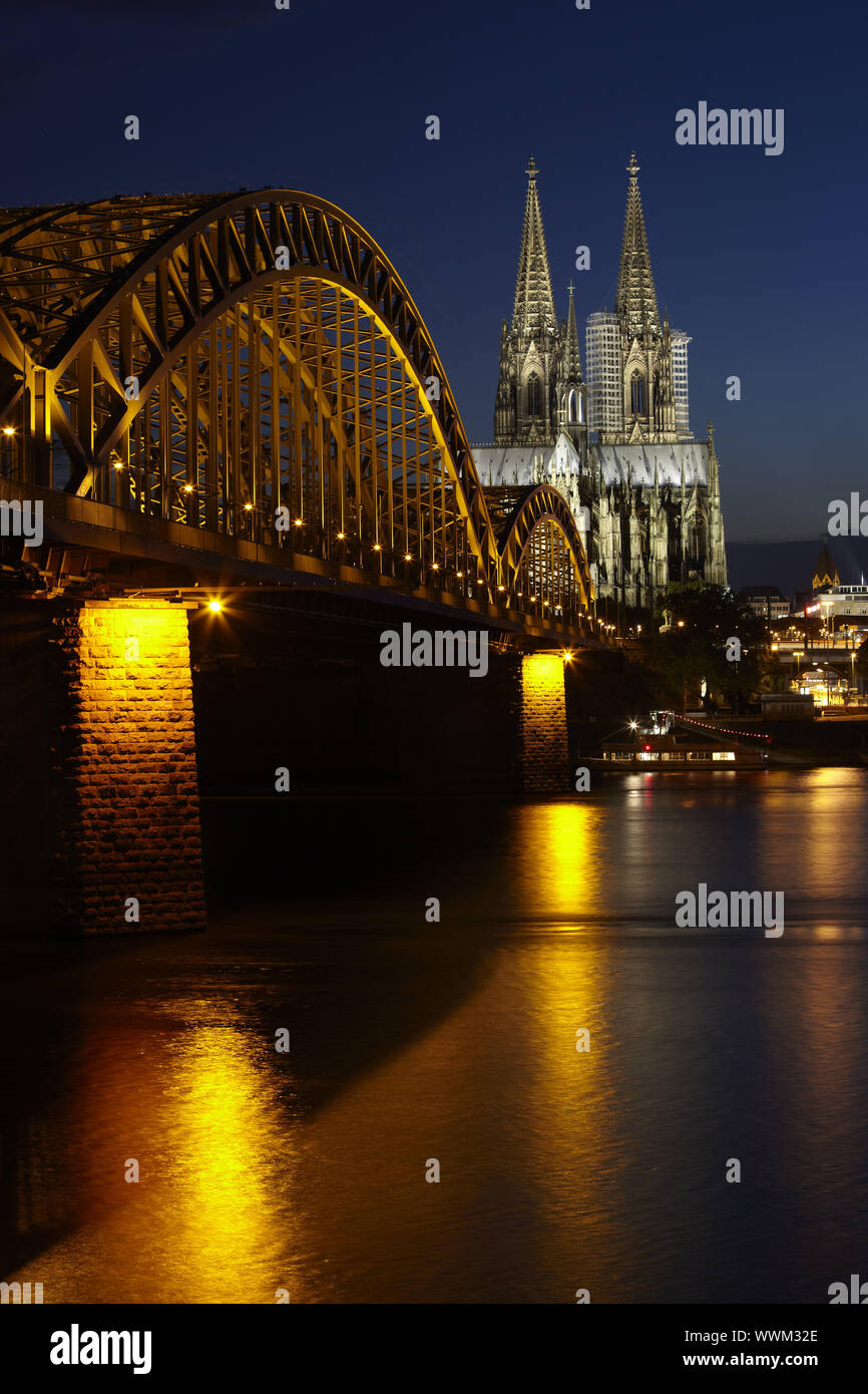 Cologne - Cologne Cathedral and Hohenzollern Bridge at night Stock ...