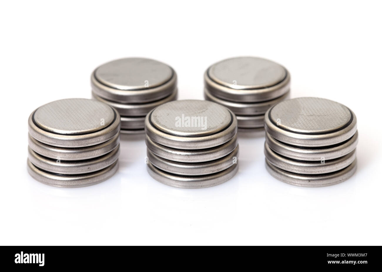 Coin Lithium batteries, on white background Stock Photo - Alamy