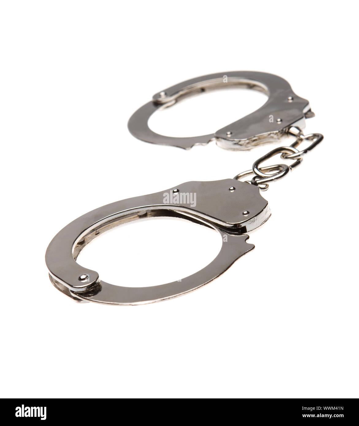Handcuffs isolated on white background Stock Photo - Alamy