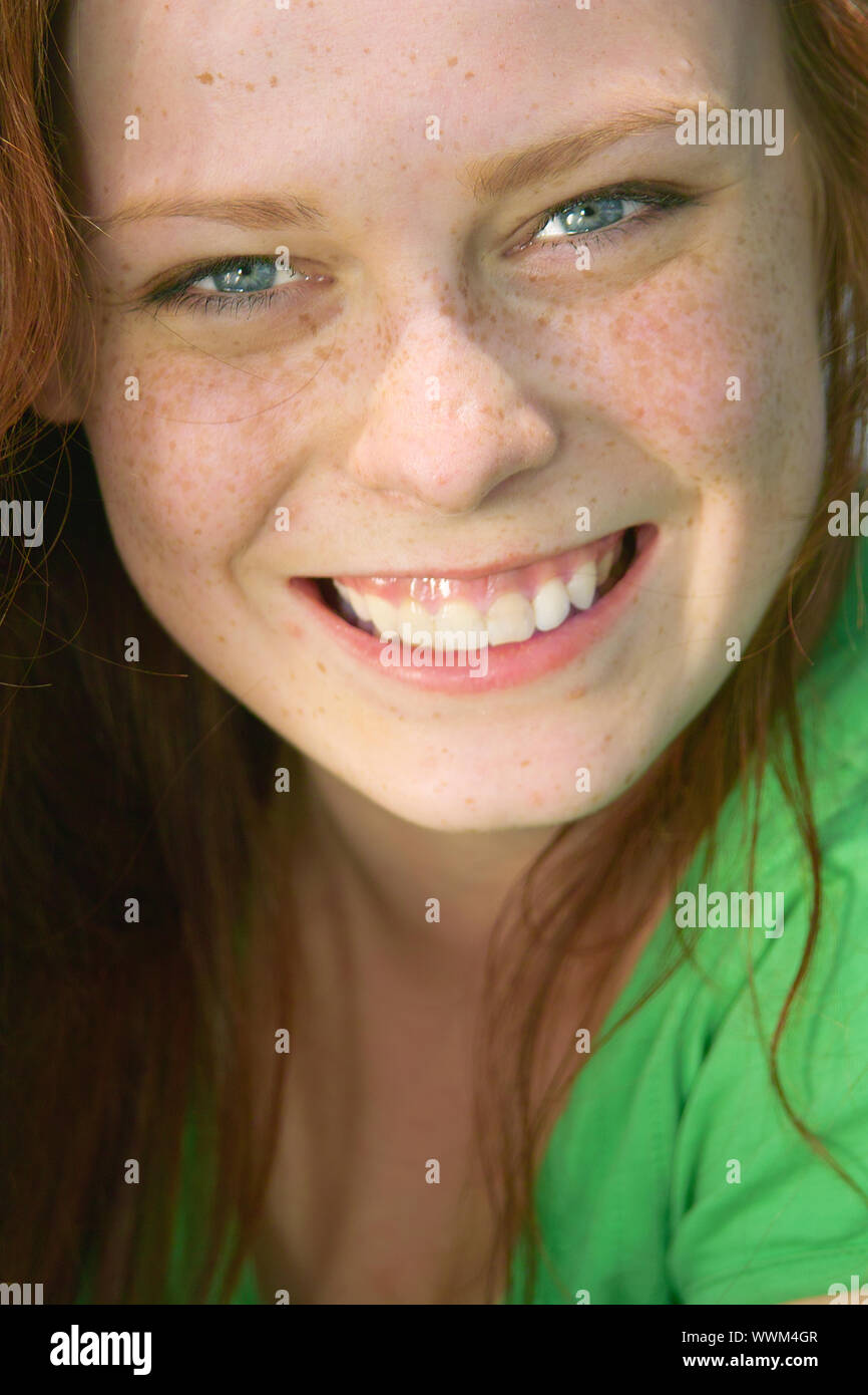 Cheerful woman laughing over green hi-res stock photography and images ...