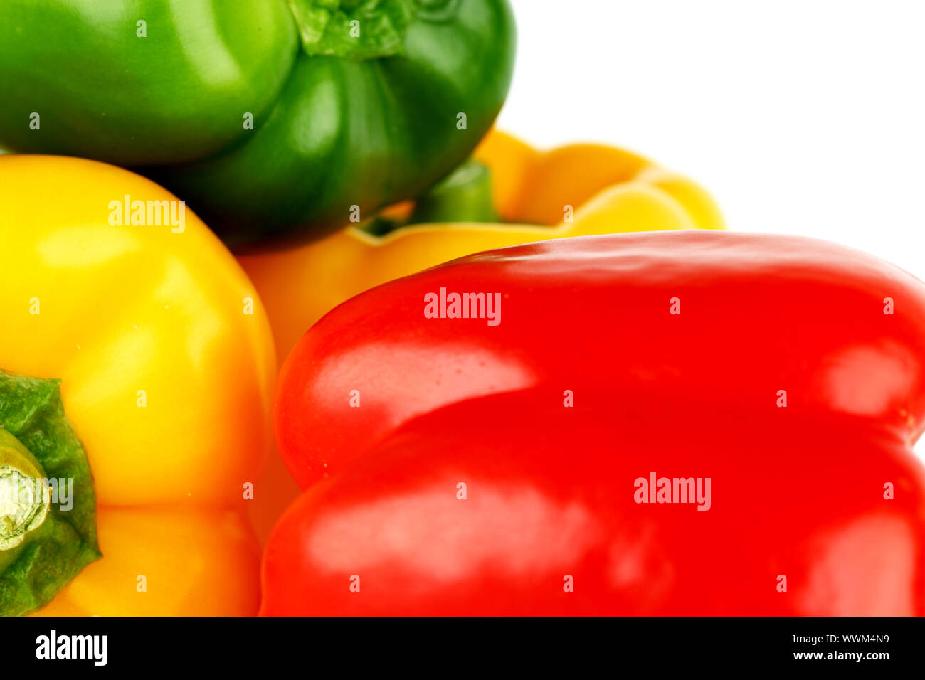 colored paprica isolated on white Stock Photo - Alamy