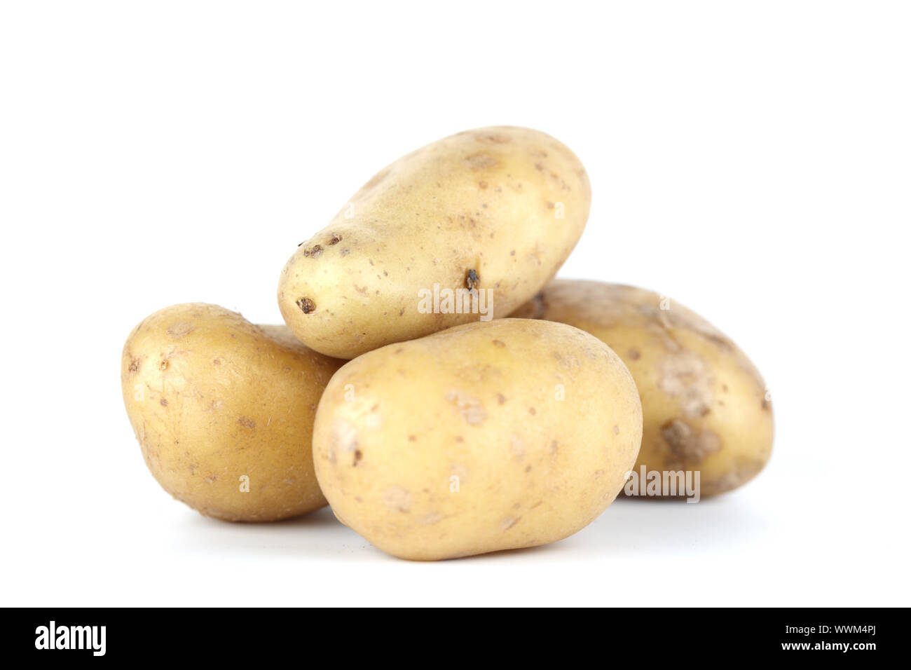 potato pile isolated on white background Stock Photo - Alamy