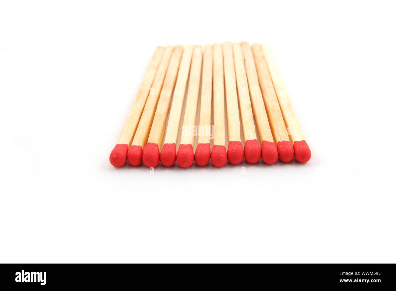 Some red matches isolated on a white background Stock Photo - Alamy