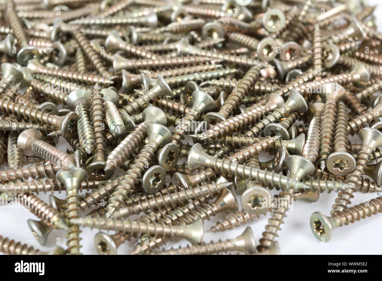 Closeup pile of screw on white Stock Photo - Alamy