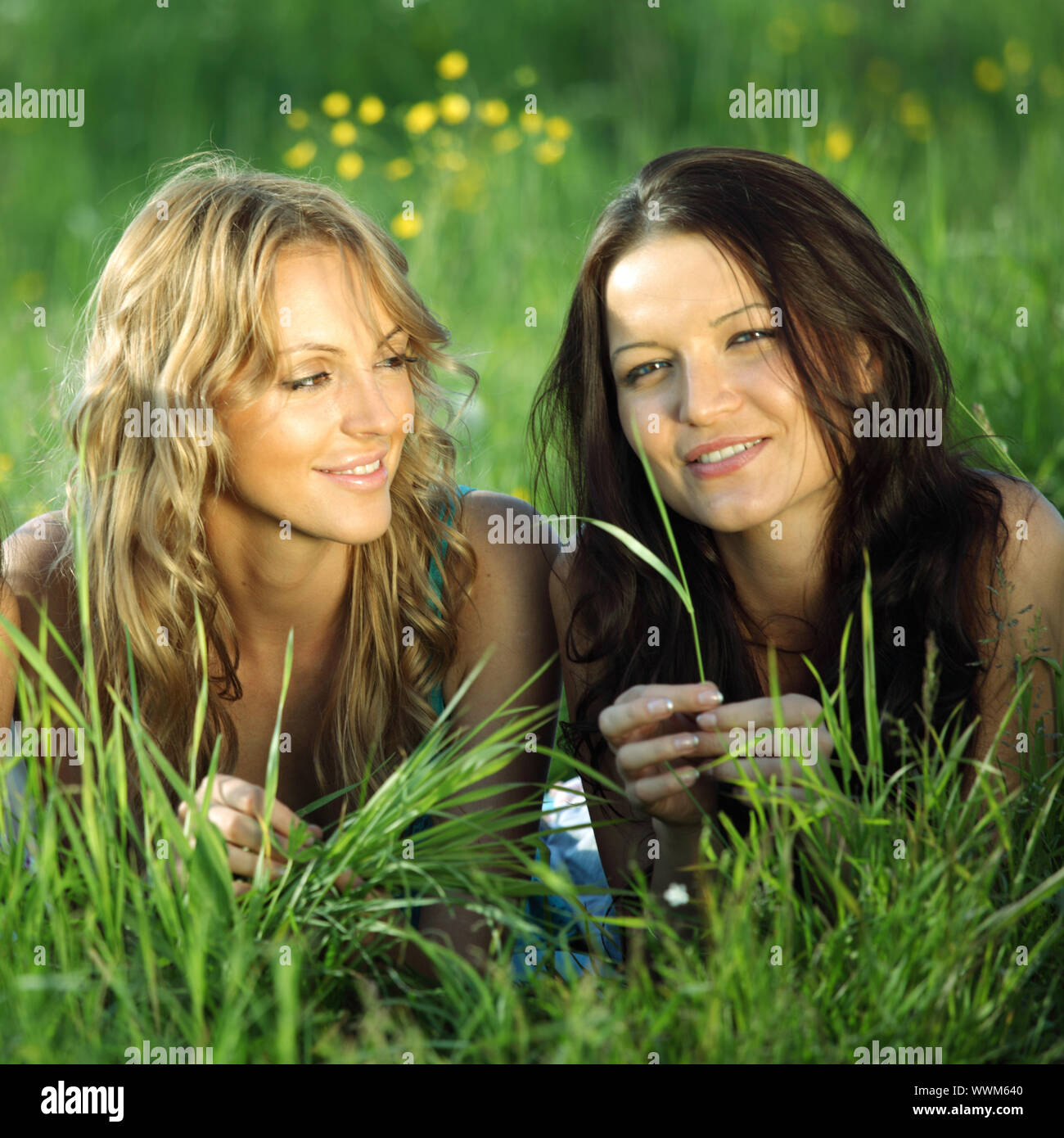 women fun on grass field Stock Photo - Alamy