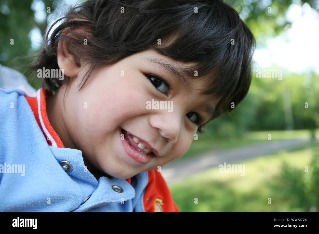 Happy little boy smiling Stock Photo - Alamy