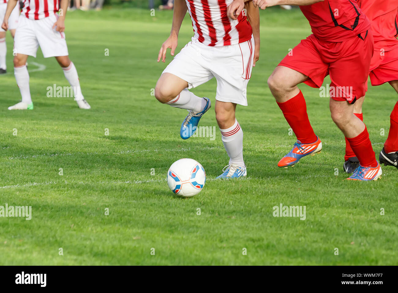 Soccer player legs dribbling in a match Stock Photo - Alamy