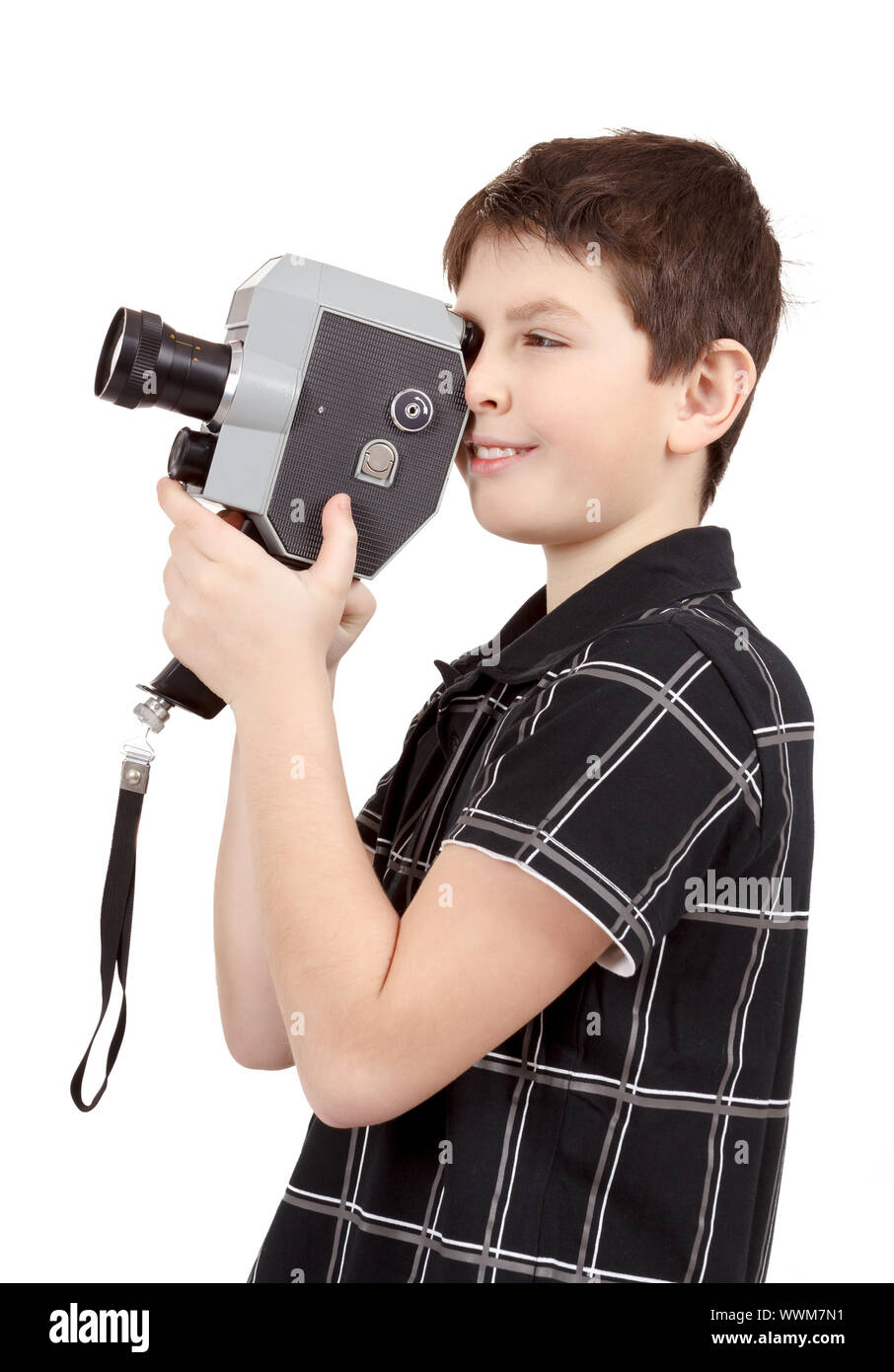 young boy with old vintage analog 8mm camera Stock Photo - Alamy