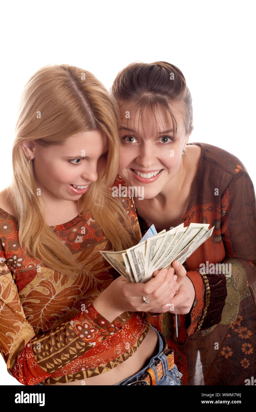Young pretty girls with money in hands Stock Photo - Alamy