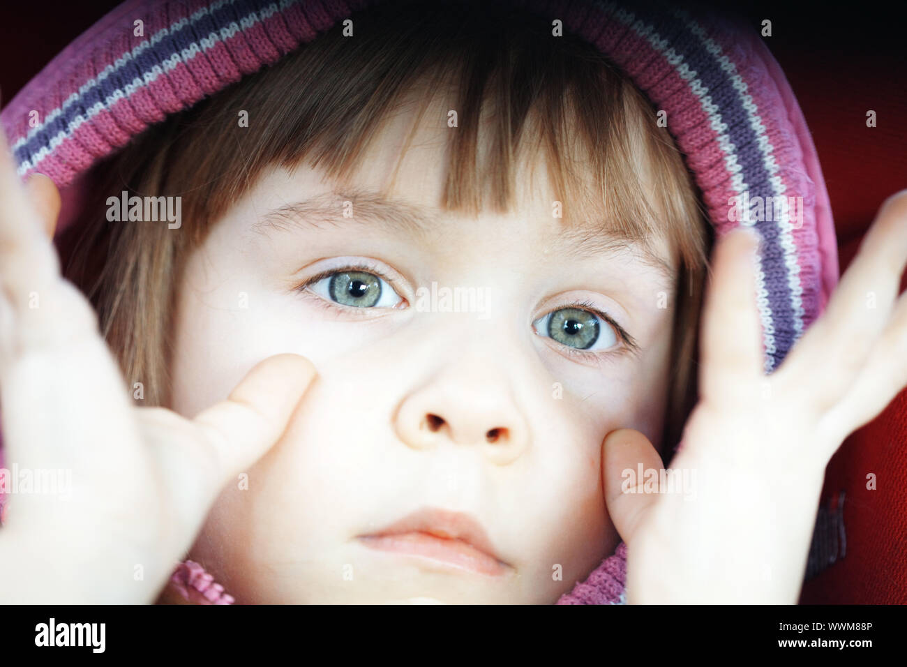 Close-up photo of kid girl playing with hands Stock Photo - Alamy