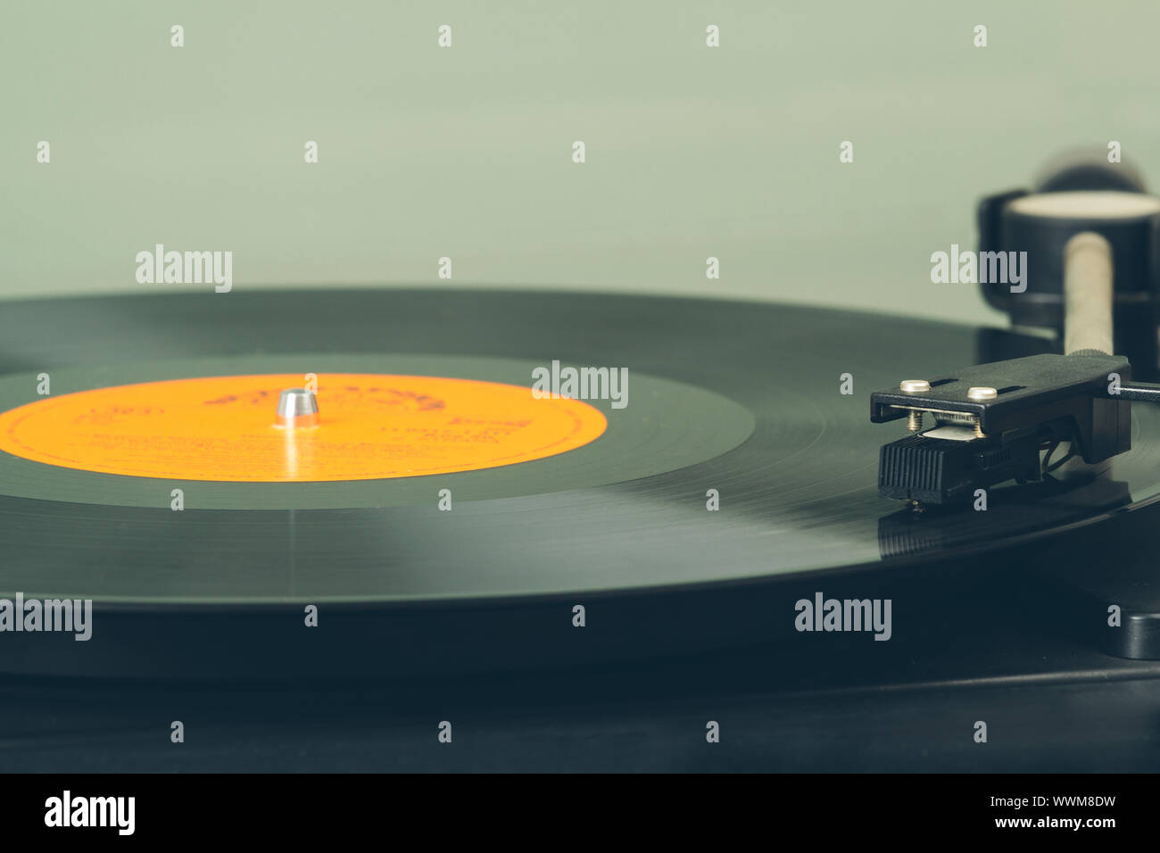 Spinning vinyl record. Motion blur image. Vintage toned Stock Photo - Alamy
