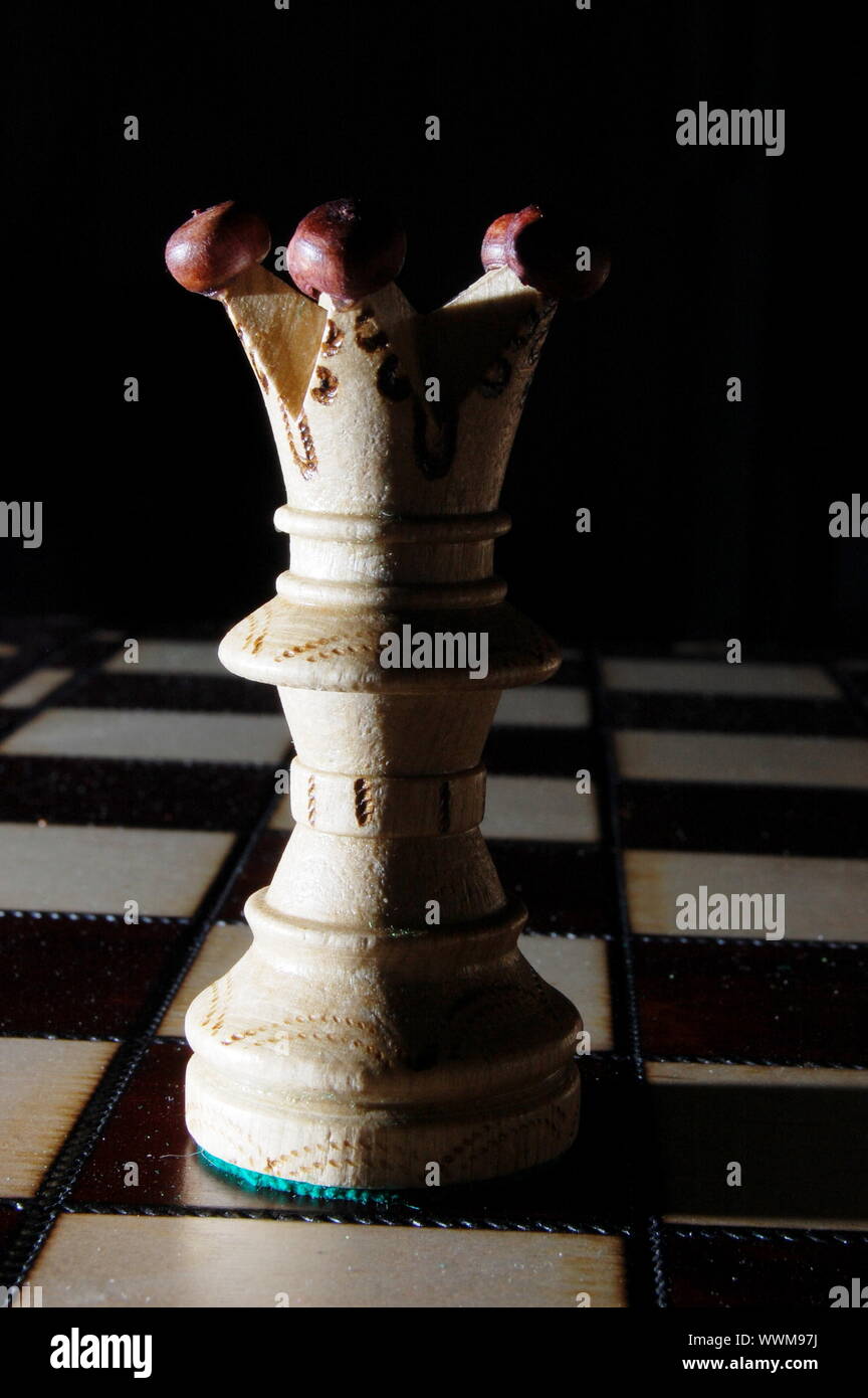 chess pieces on chess board showing power and success Stock Photo - Alamy