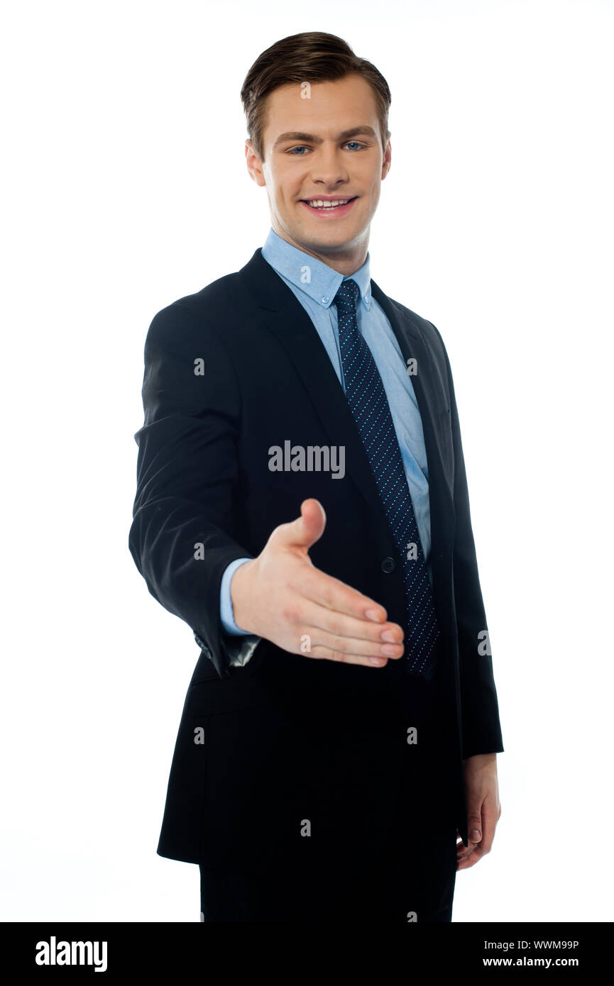 Successful young businessman offering handshake Stock Photo - Alamy
