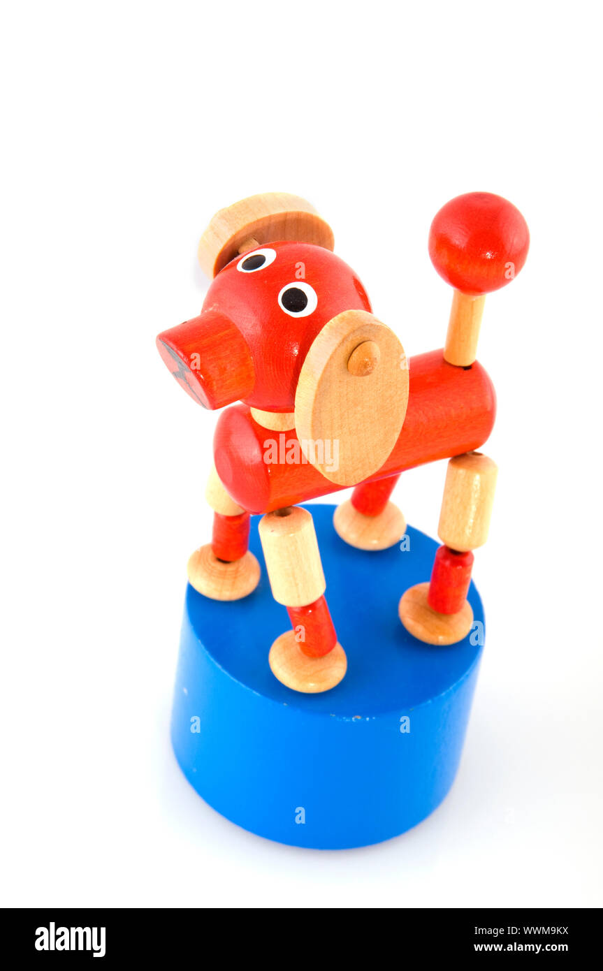 red wooden toy dog Stock Photo - Alamy