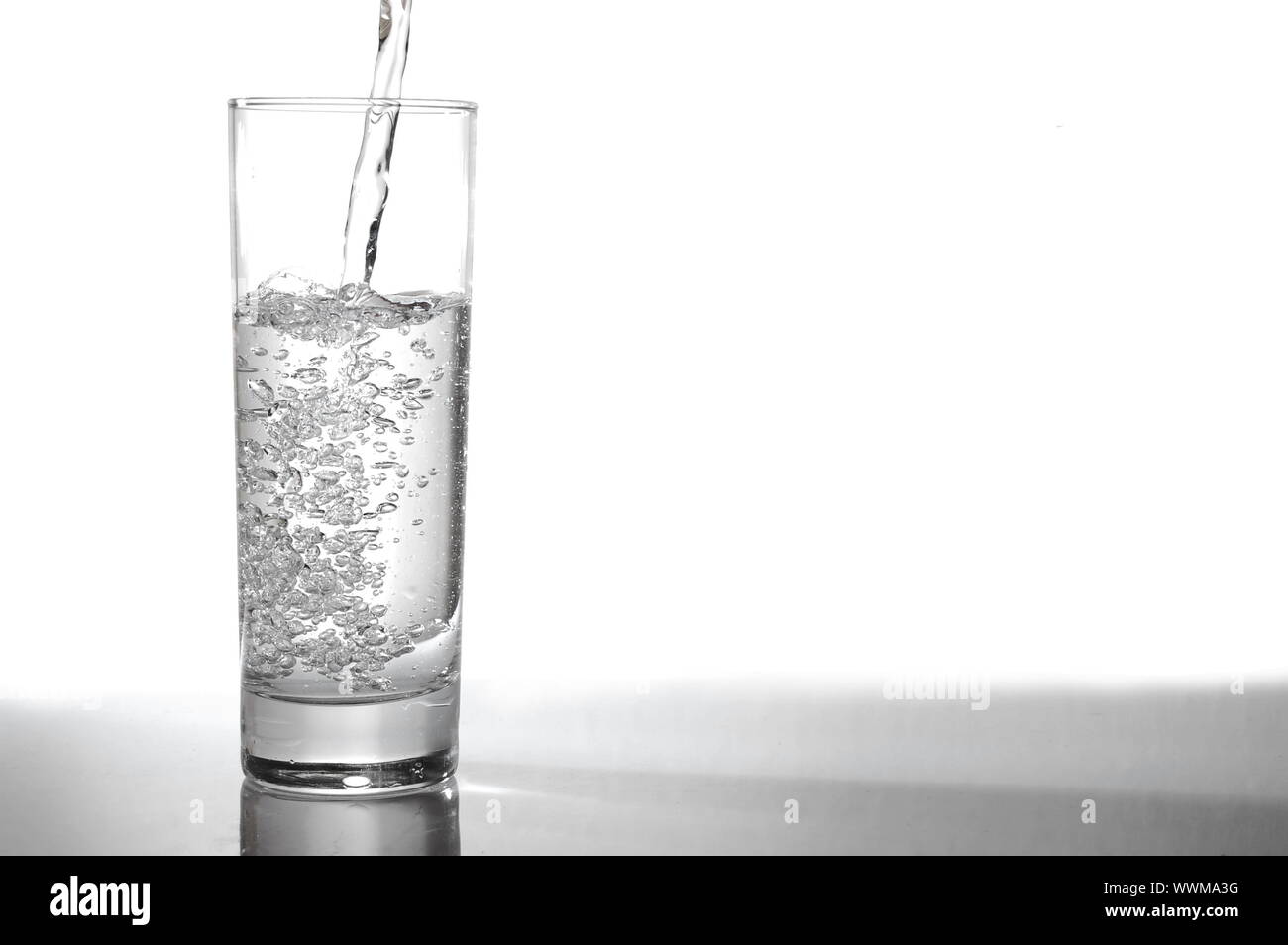 glass of pouring fresh and cold water Stock Photo - Alamy