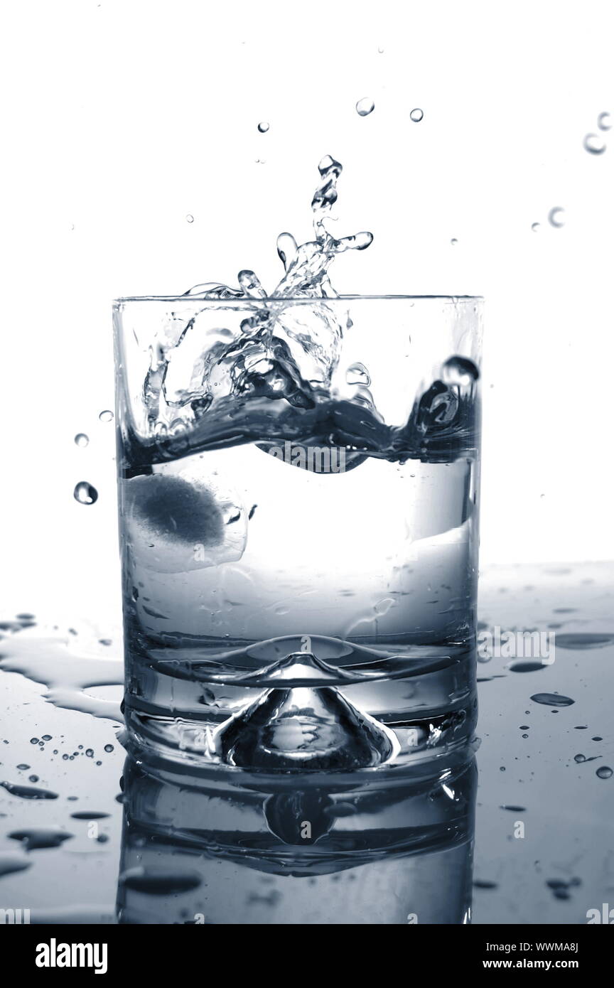 cool splashing water with ice cube isolated on white background Stock ...