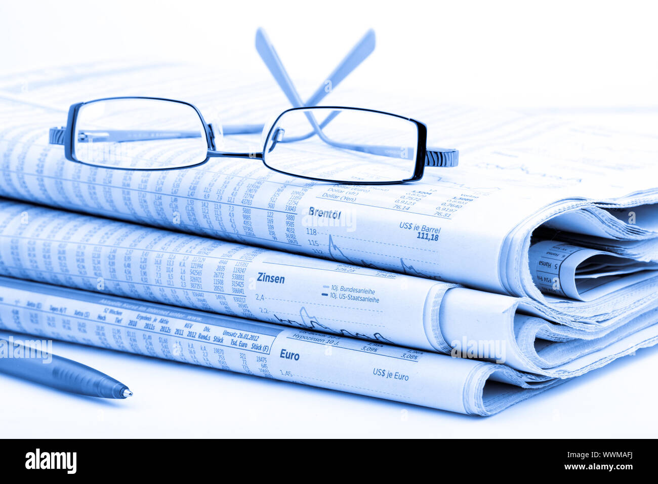 Pile of newspapers blue background hi-res stock photography and images ...