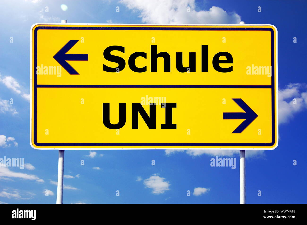 school and university education concept with yellow road sign Stock ...