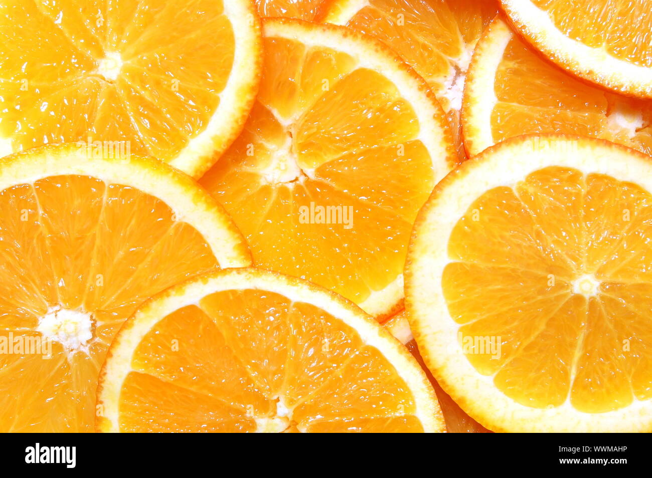 healthy orange fruit background with sliced oranges Stock Photo - Alamy