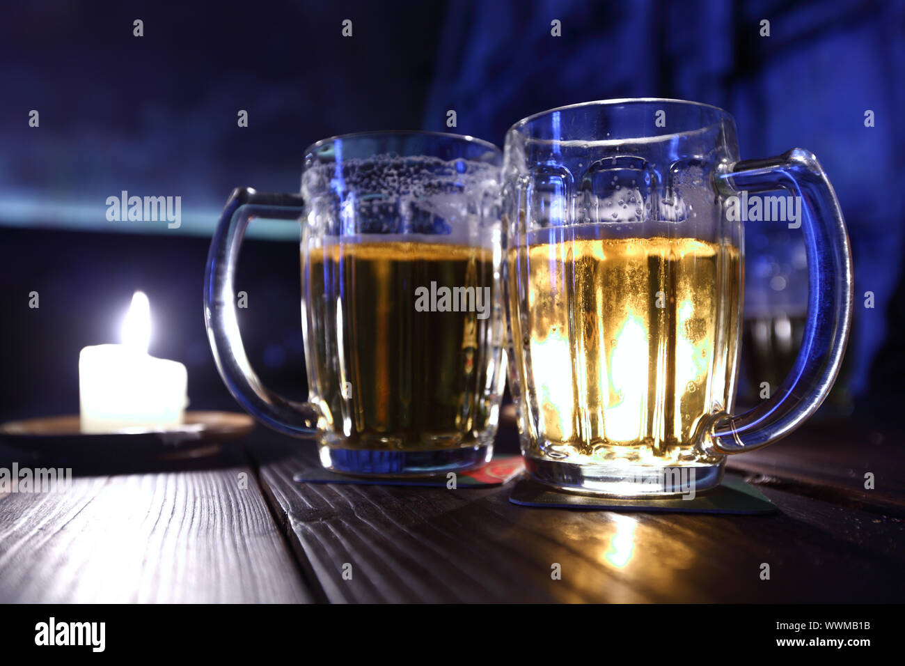 beer in dark room close up Stock Photo - Alamy