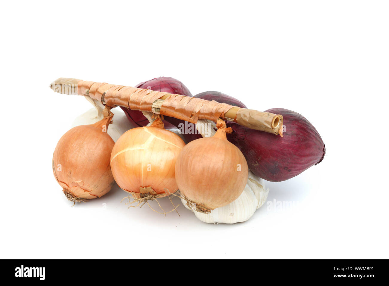 onion pile isolated on white Stock Photo - Alamy