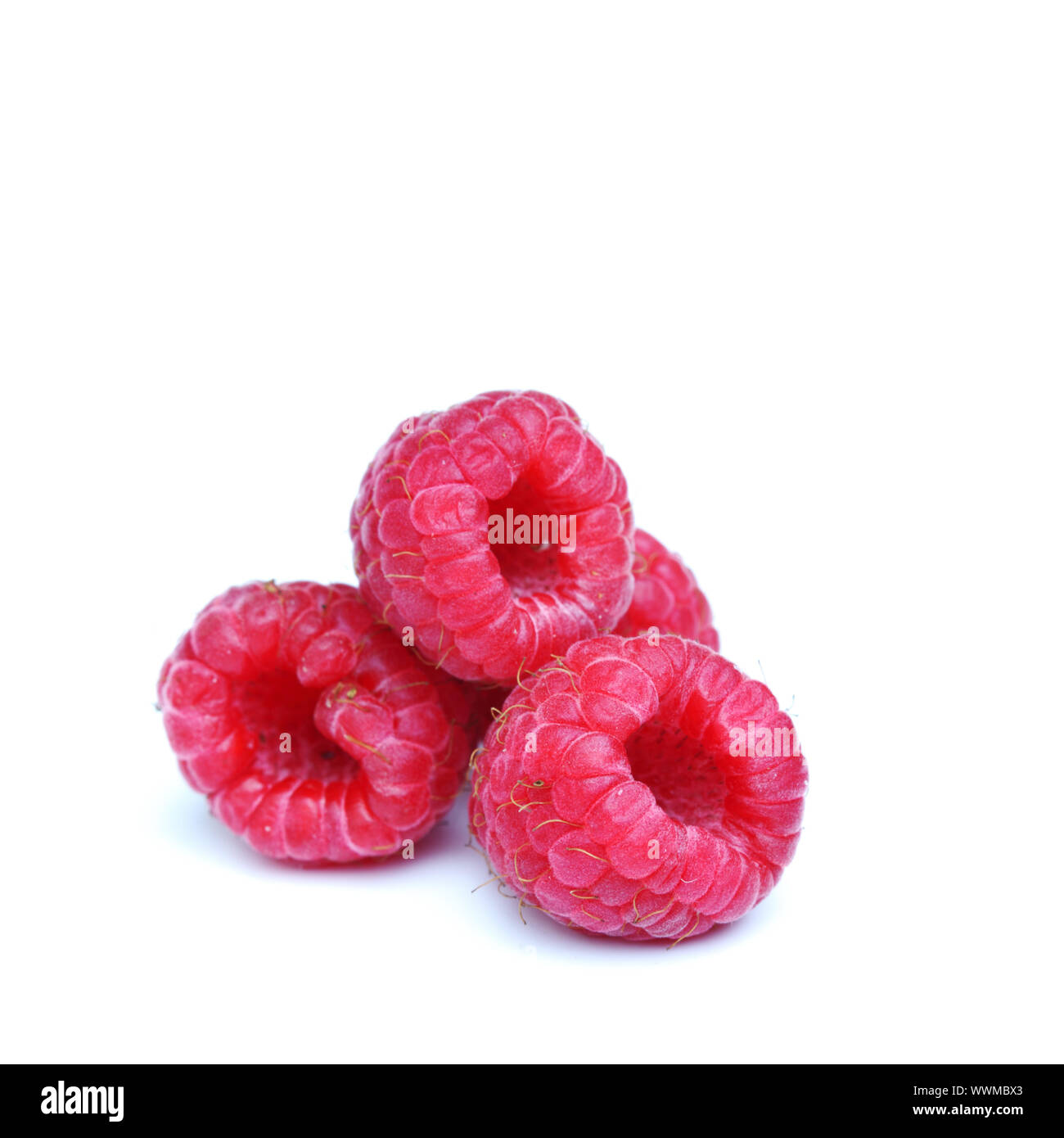 raspberry pile isolated on white Stock Photo - Alamy