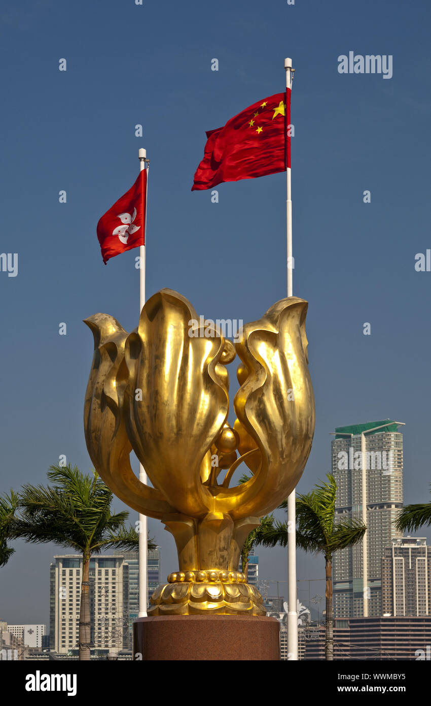Statue of the Eternally Blooming Bauhinia with the Flags of Hong Kong ...