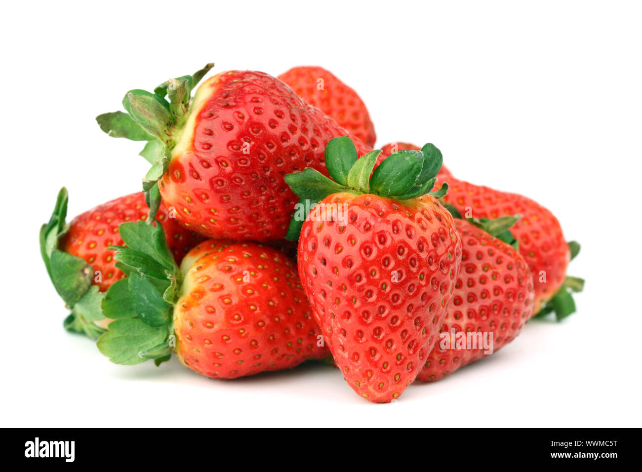 strawberry pile on white background Stock Photo - Alamy