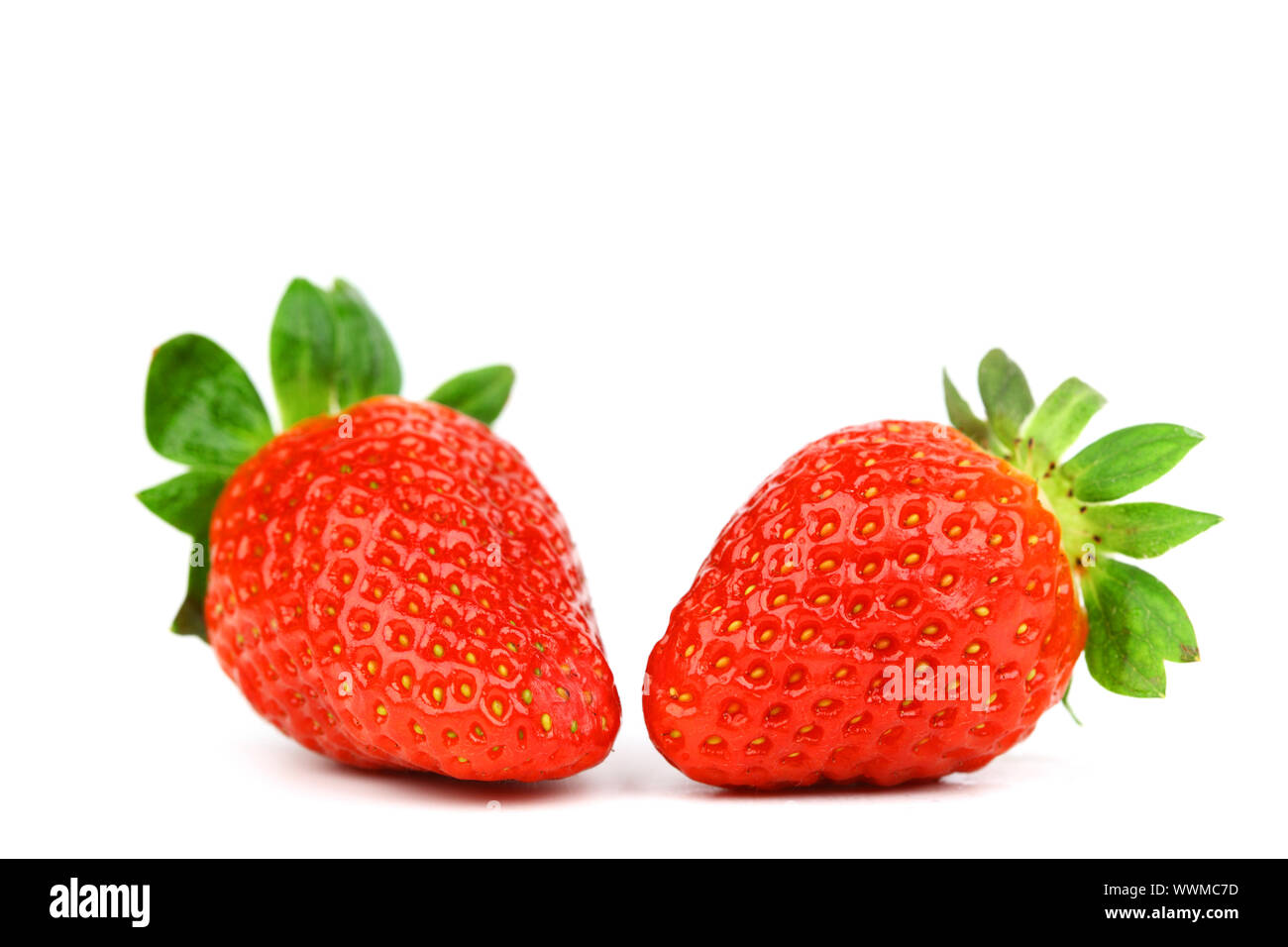 strawberry pile isolated on white background Stock Photo - Alamy