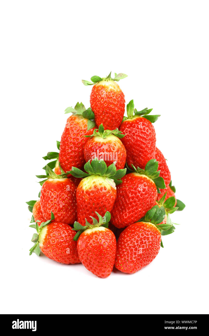 strawberry pile isolated on white background Stock Photo - Alamy