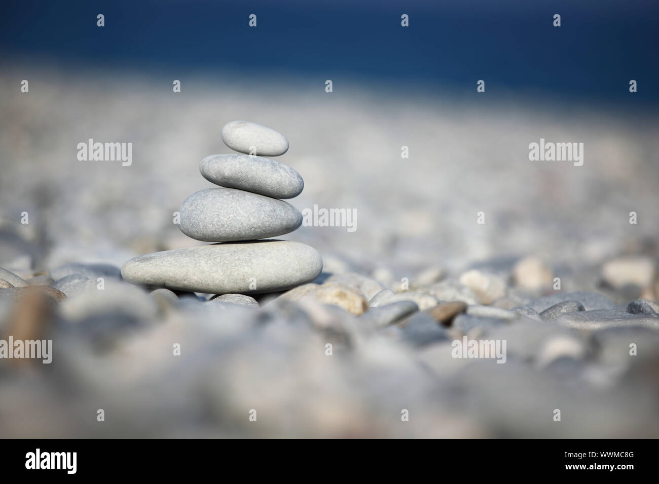 rock stack sea on background Stock Photo - Alamy