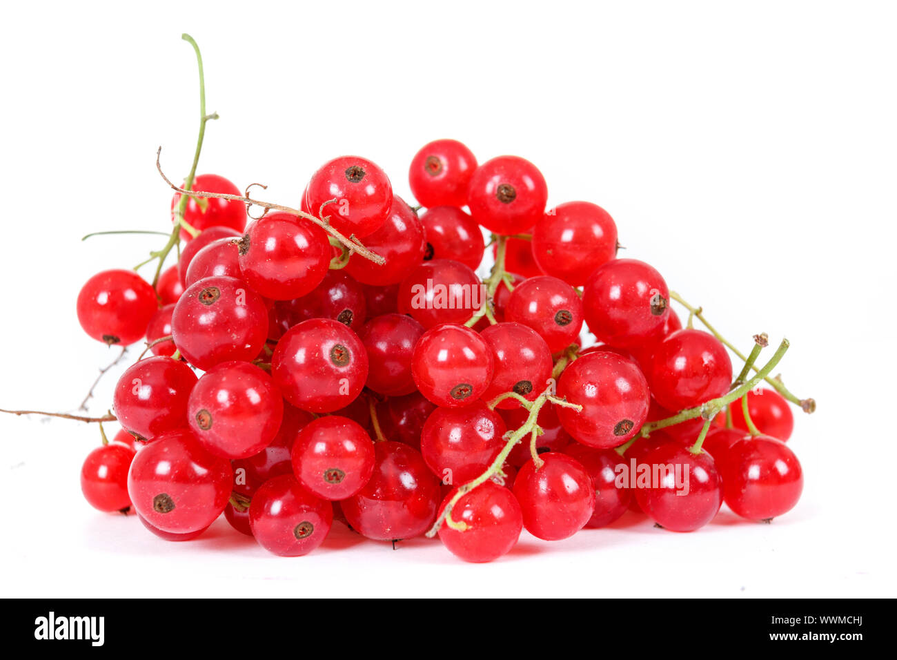 pile berries of red currant on white background Stock Photo - Alamy