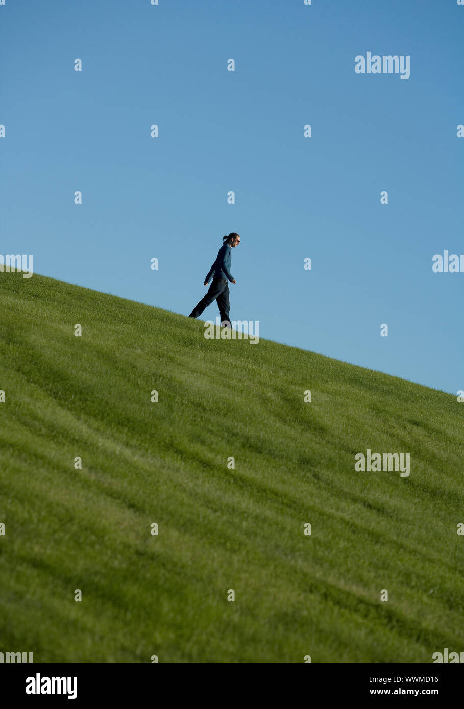 Side view of a walking man Stock Photo - Alamy