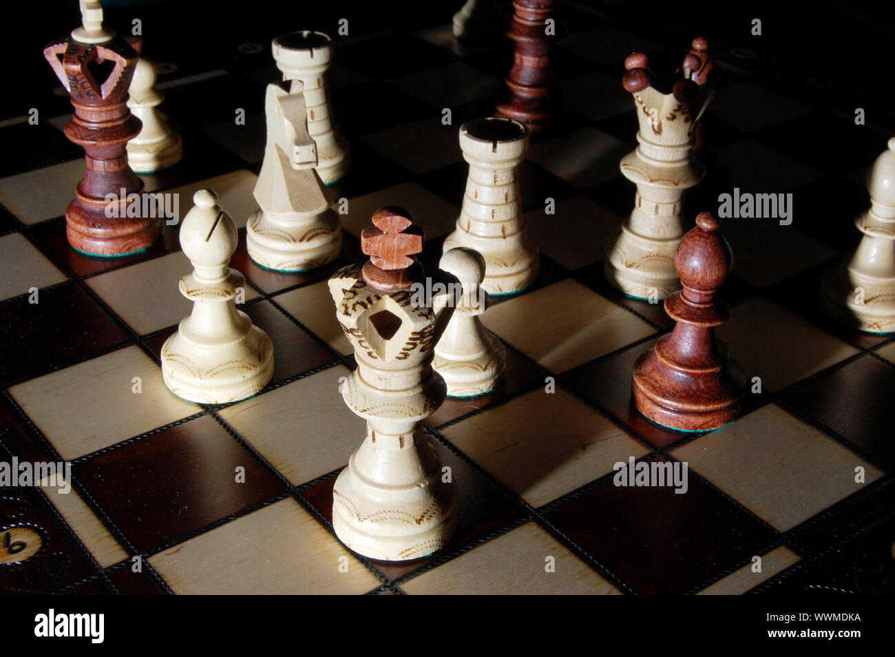 chess pieces on chess board showing power and success Stock Photo - Alamy