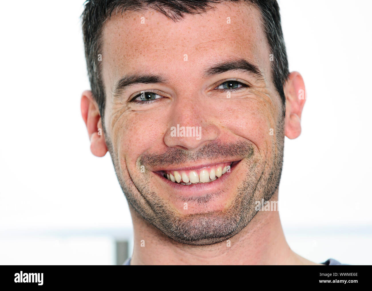 natural and relaxed looking young man Stock Photo - Alamy